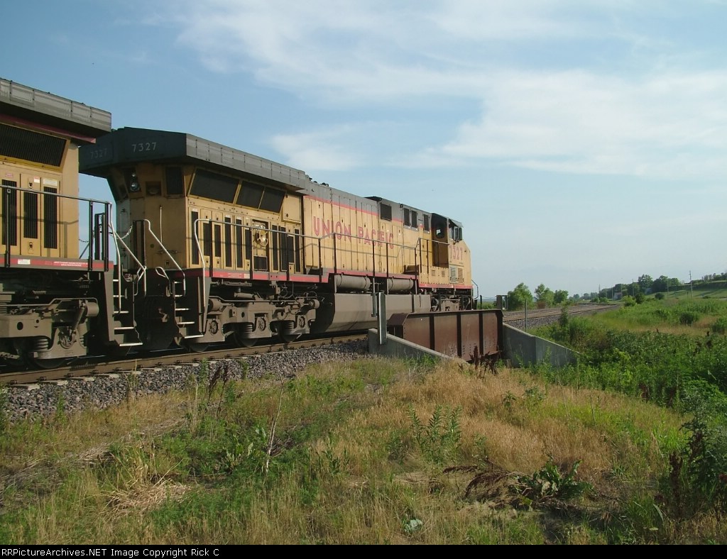 UP 7327 Crosses A Bridge